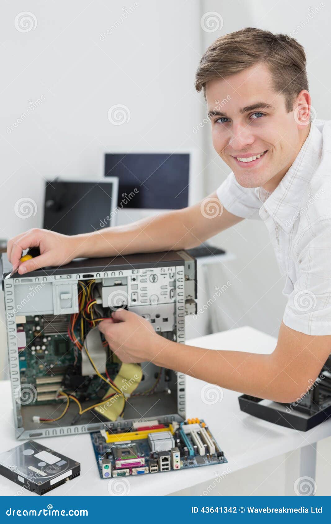Young Technician Working on Broken Computer Stock Photo - Image of ...