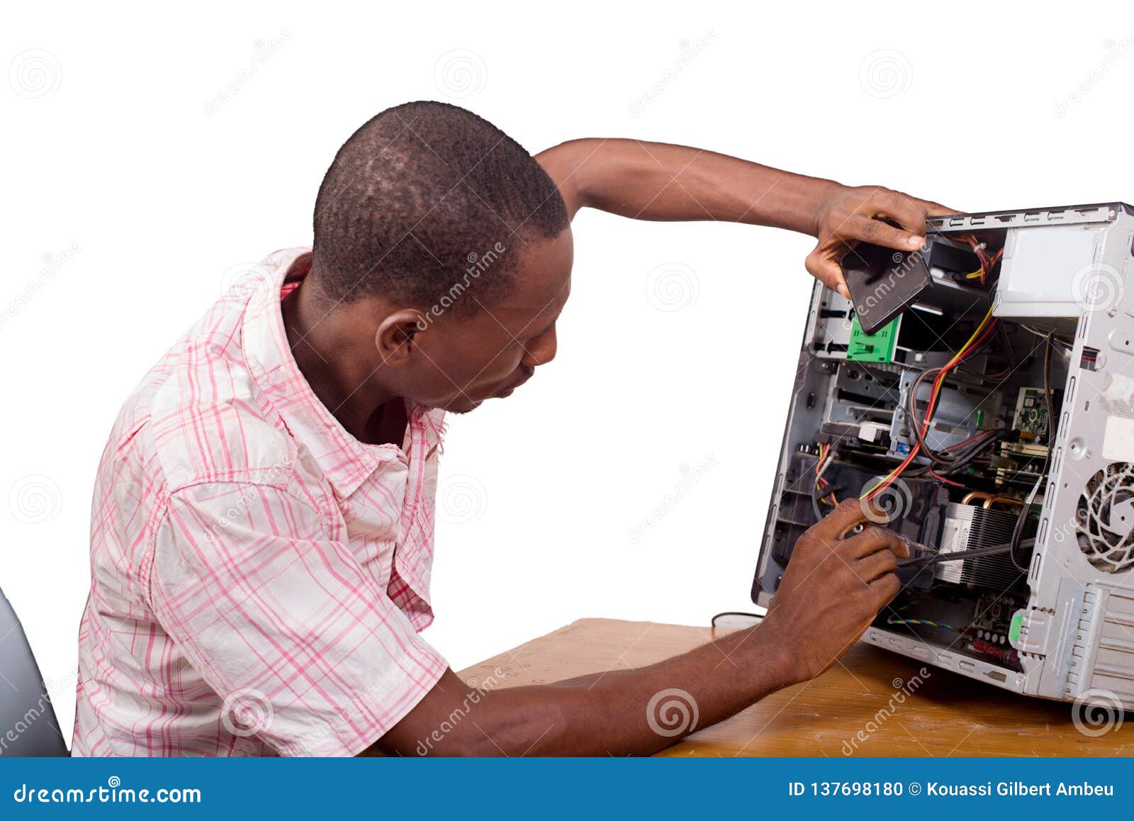Young Technician Repairing a Computer Stock Photo - Image of system ...
