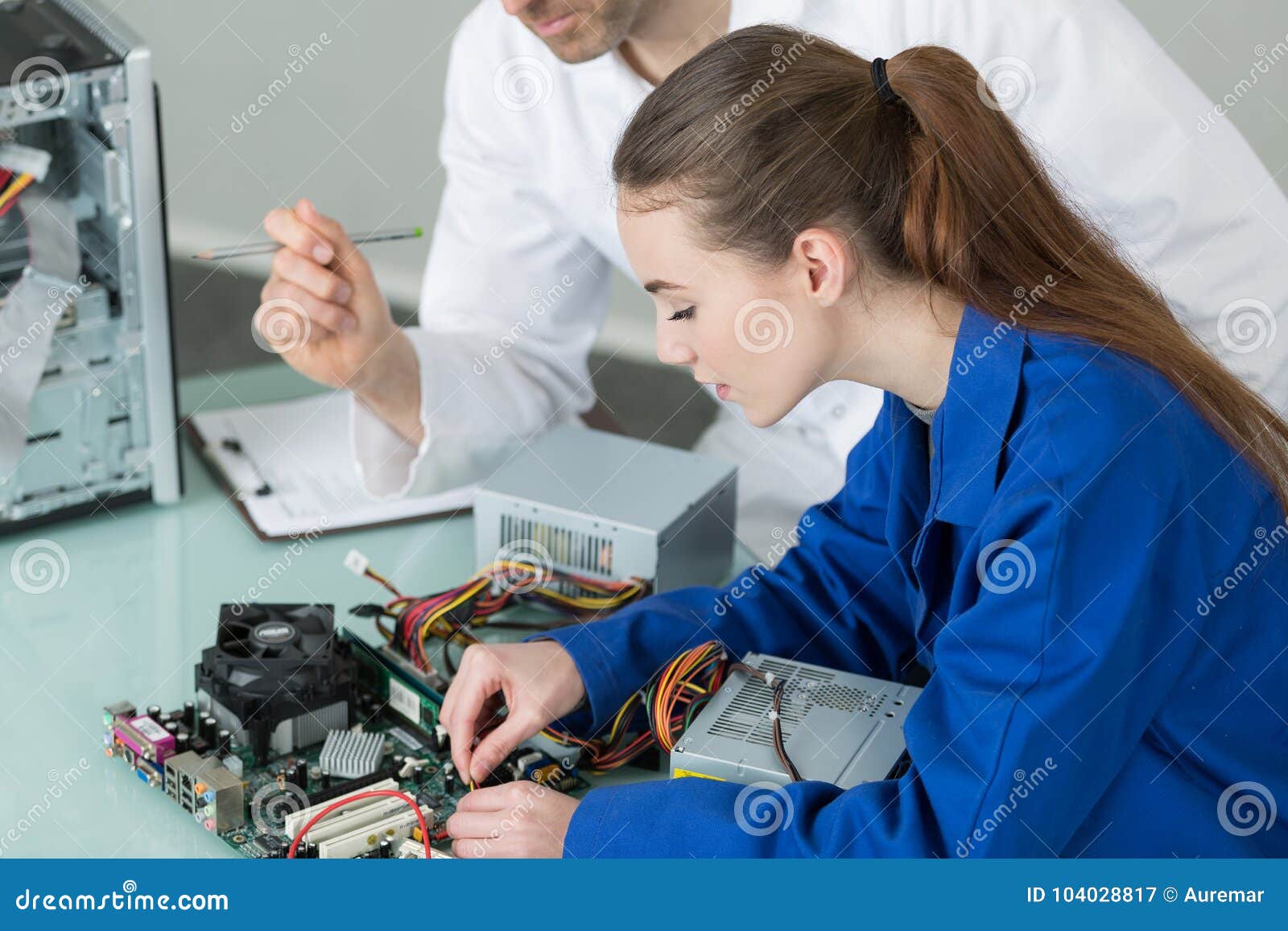 Young Technician Working on Broken Computer in Office Stock Image ...