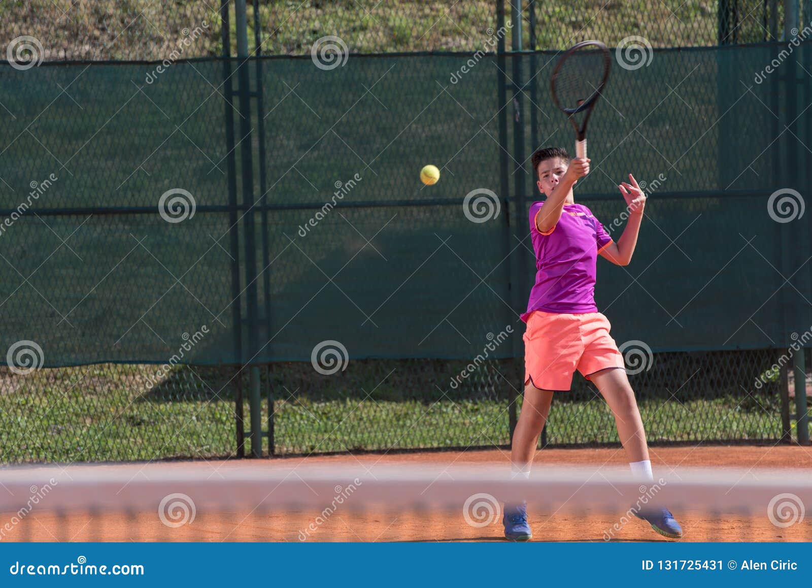 Young Tennis Player Hitting the Ball by Forehand Stock Image - Image of ...
