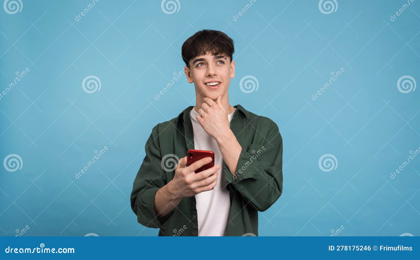 Young Thinking Man Holding His Phone Stock Photo - Image of female ...