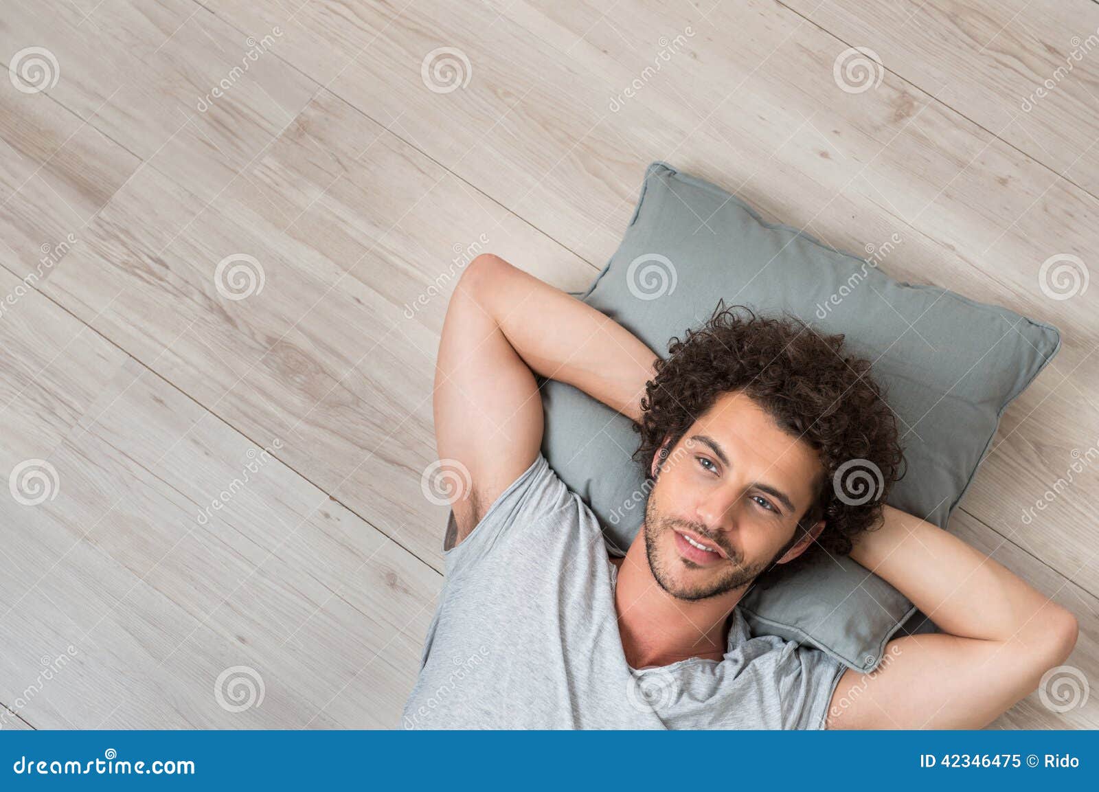 Young Thinking Man Lying on Floor Stock Image - Image of decision ...