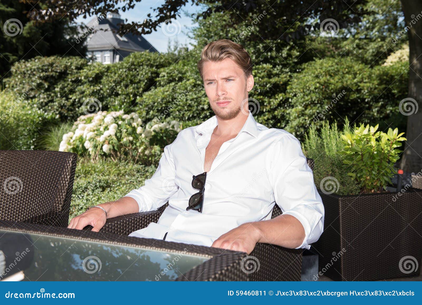 Young Thinking Man Sitting in the Garden Stock Image - Image of ...
