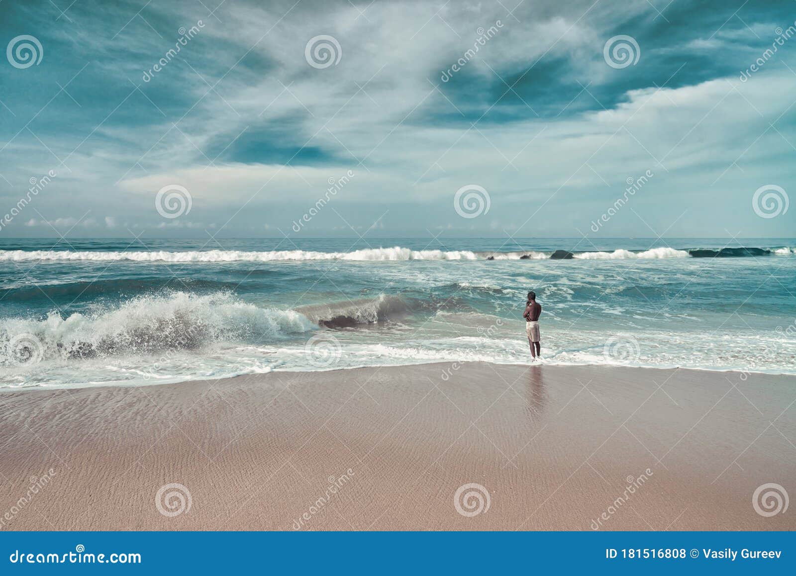A Young Thinking Man Standing on the Beach Stock Photo - Image of blue ...