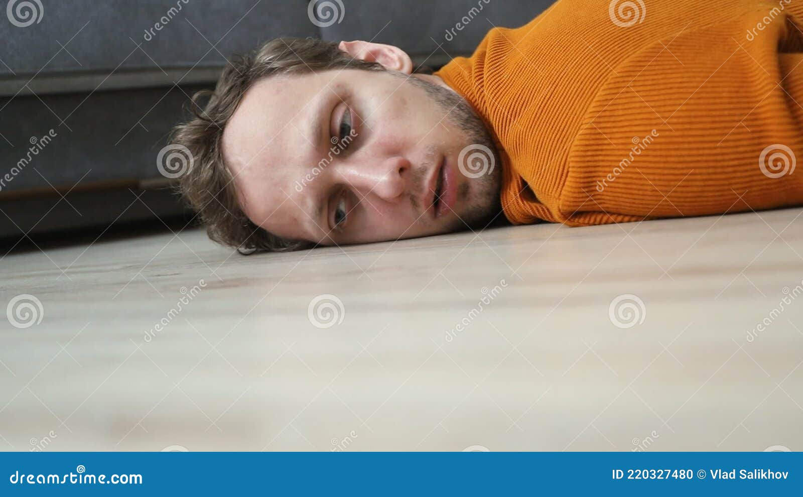 Young Tired Man Suddenly Waking Up on Floor at Home Stock Footage ...