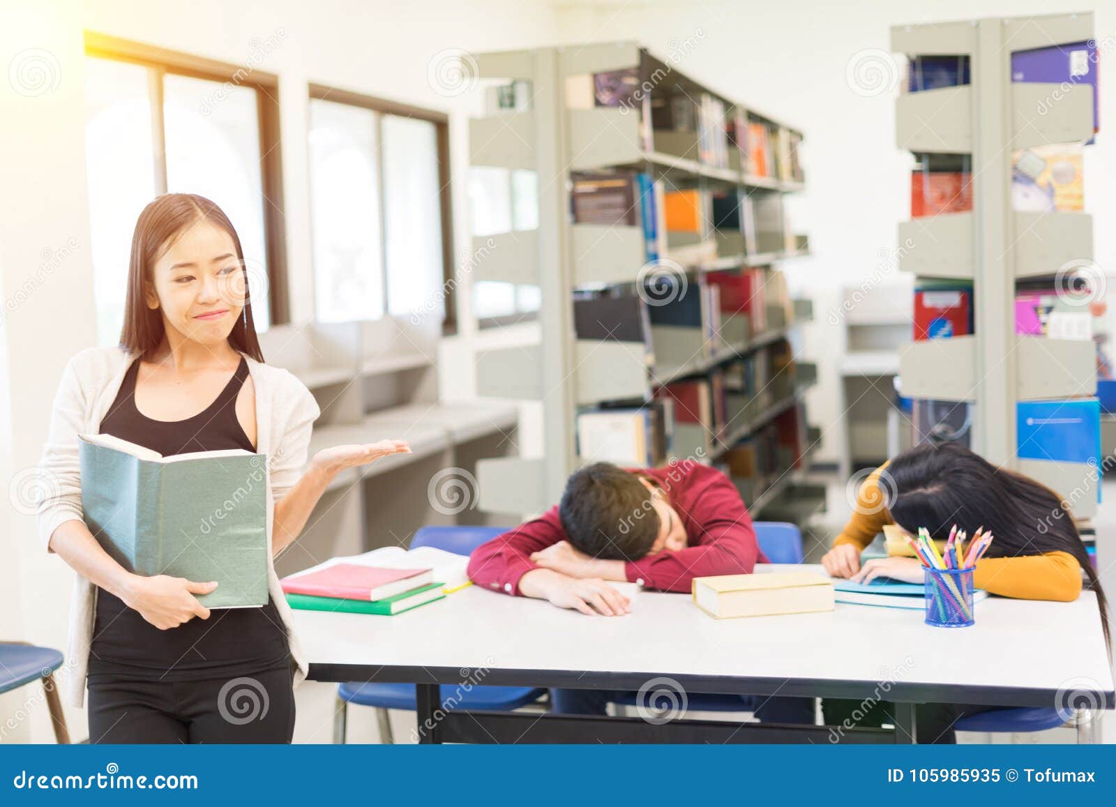 Students rest in library stock image. Image of girl - 105985935