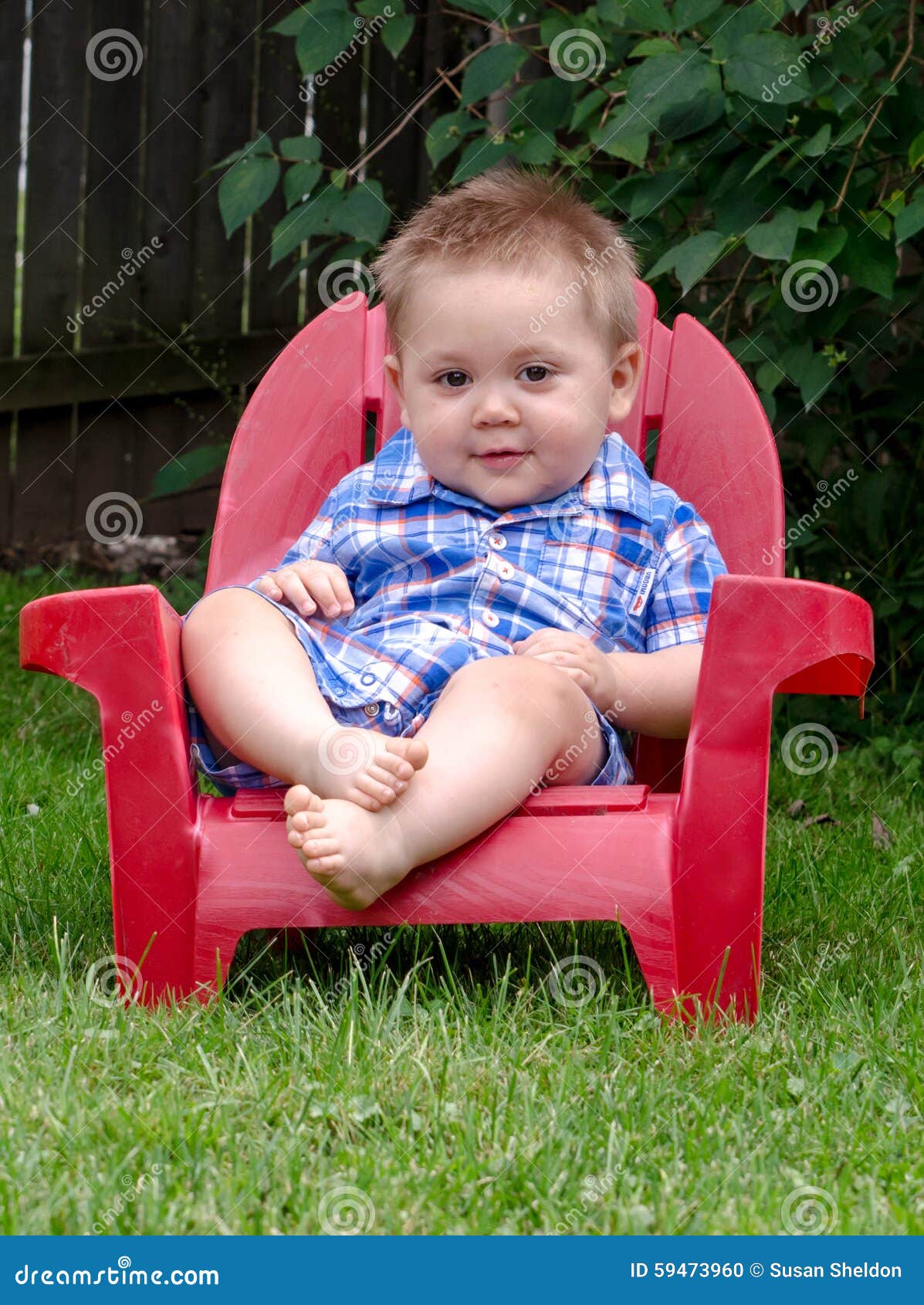 Young toddler in red chair stock photo. Image of toddler - 59473960