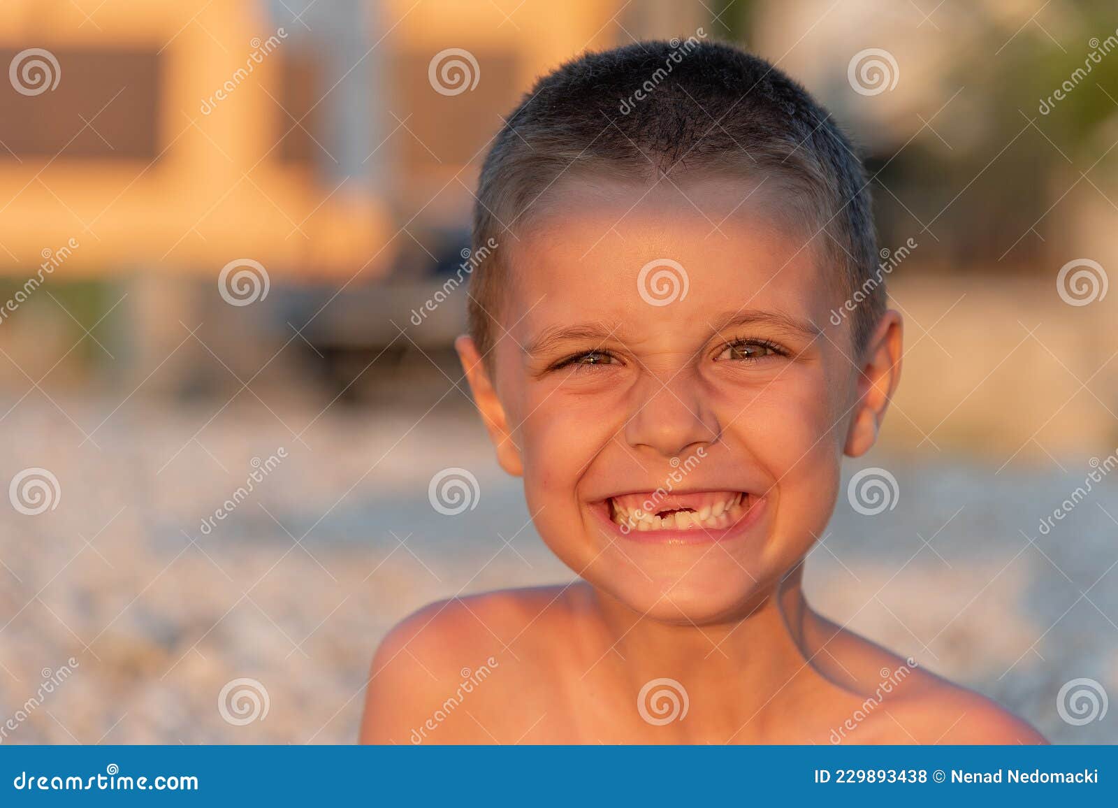 Young Toothless Boy at the Beach Stock Photo - Image of caucasian ...