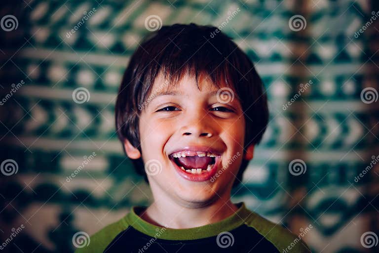 Young Toothless Boy Smiling Stock Photo - Image of green, toothless ...