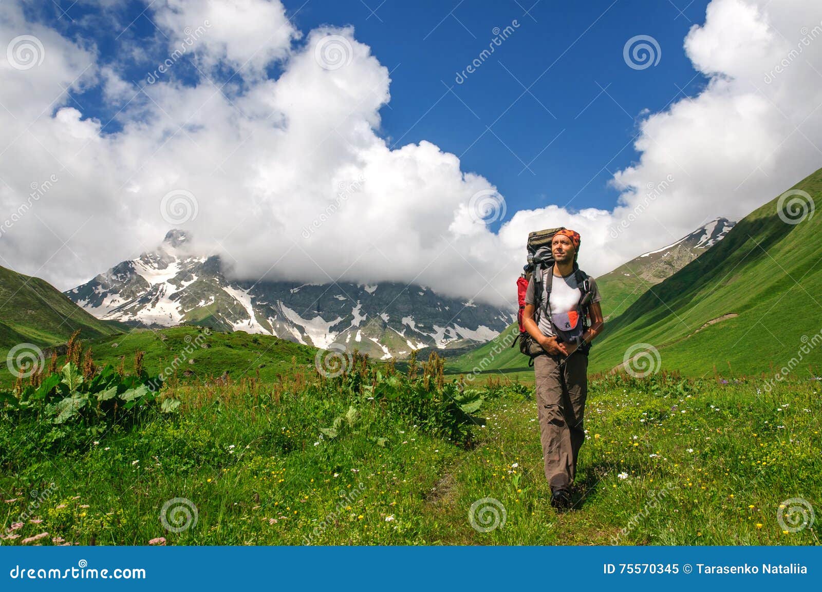 Young Tourist Resting on Top Overlooking the Valley Stock Image - Image ...