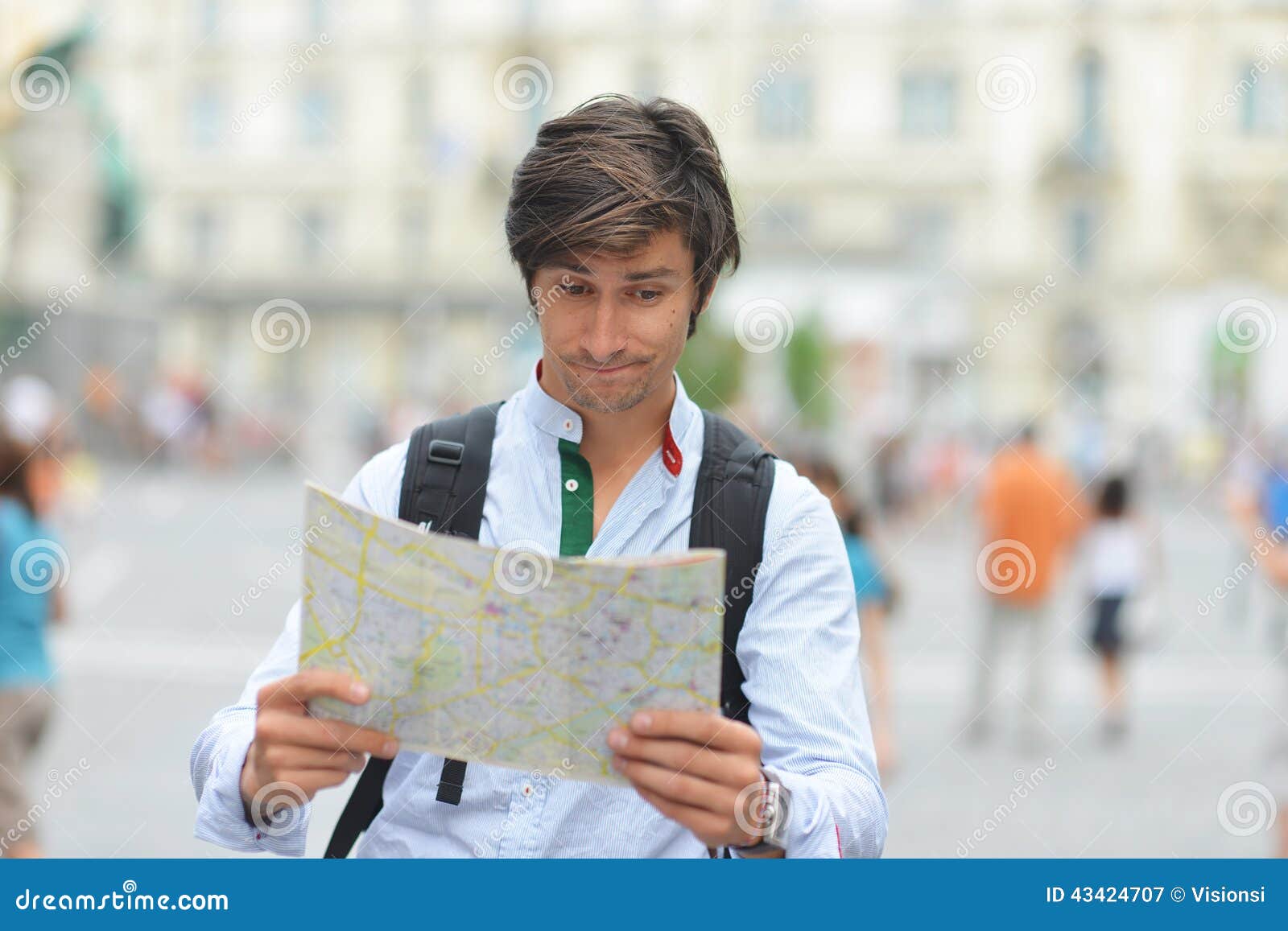 Young Tourist Watching the Map Stock Image - Image of standing, male ...