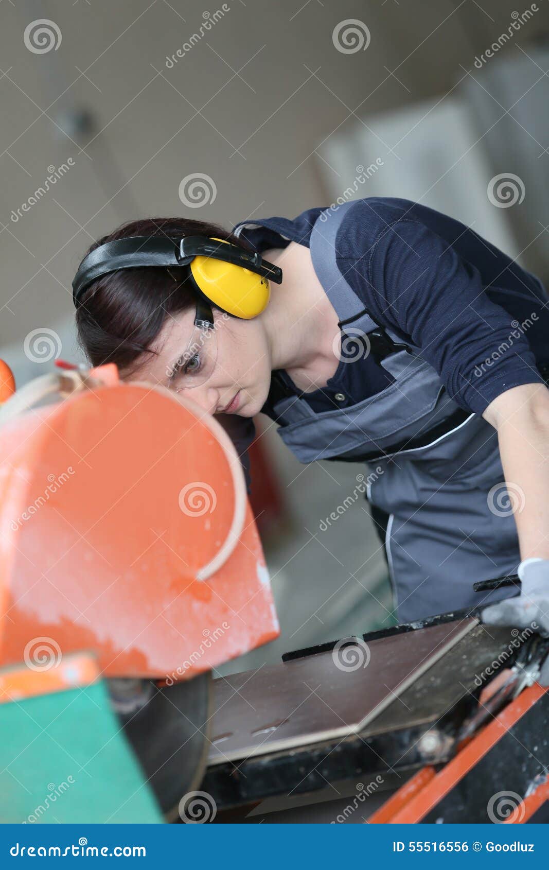 Young Trainee in Professional Training Using Tile Grinder Stock Photo ...