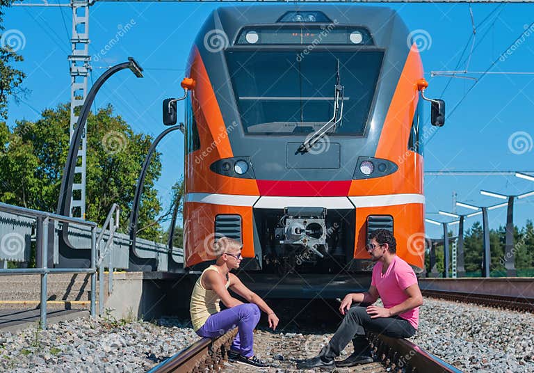 Young Trendy Guys in Front of Train Stock Image - Image of guys ...