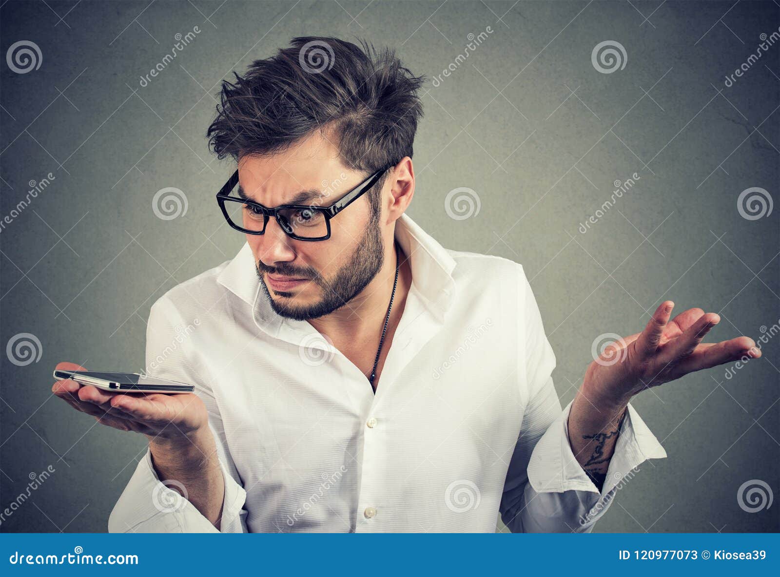 Man with Smartphone in Misunderstanding Stock Image - Image of ...