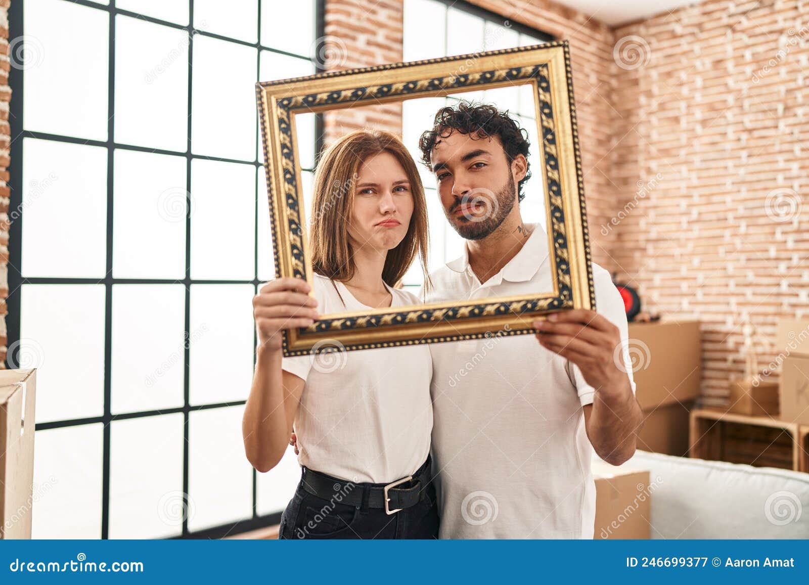Young Two People Holding Empty Frame Together Depressed and Worry for ...