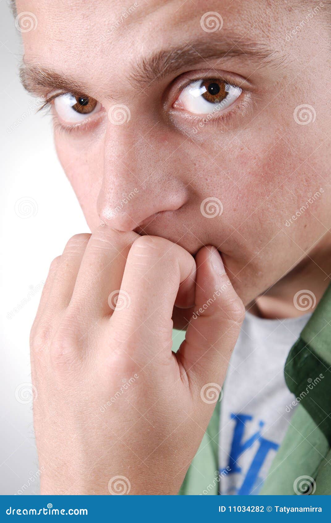 Young Unconfident Guy Clothing His Mouth Stock Photo | CartoonDealer ...