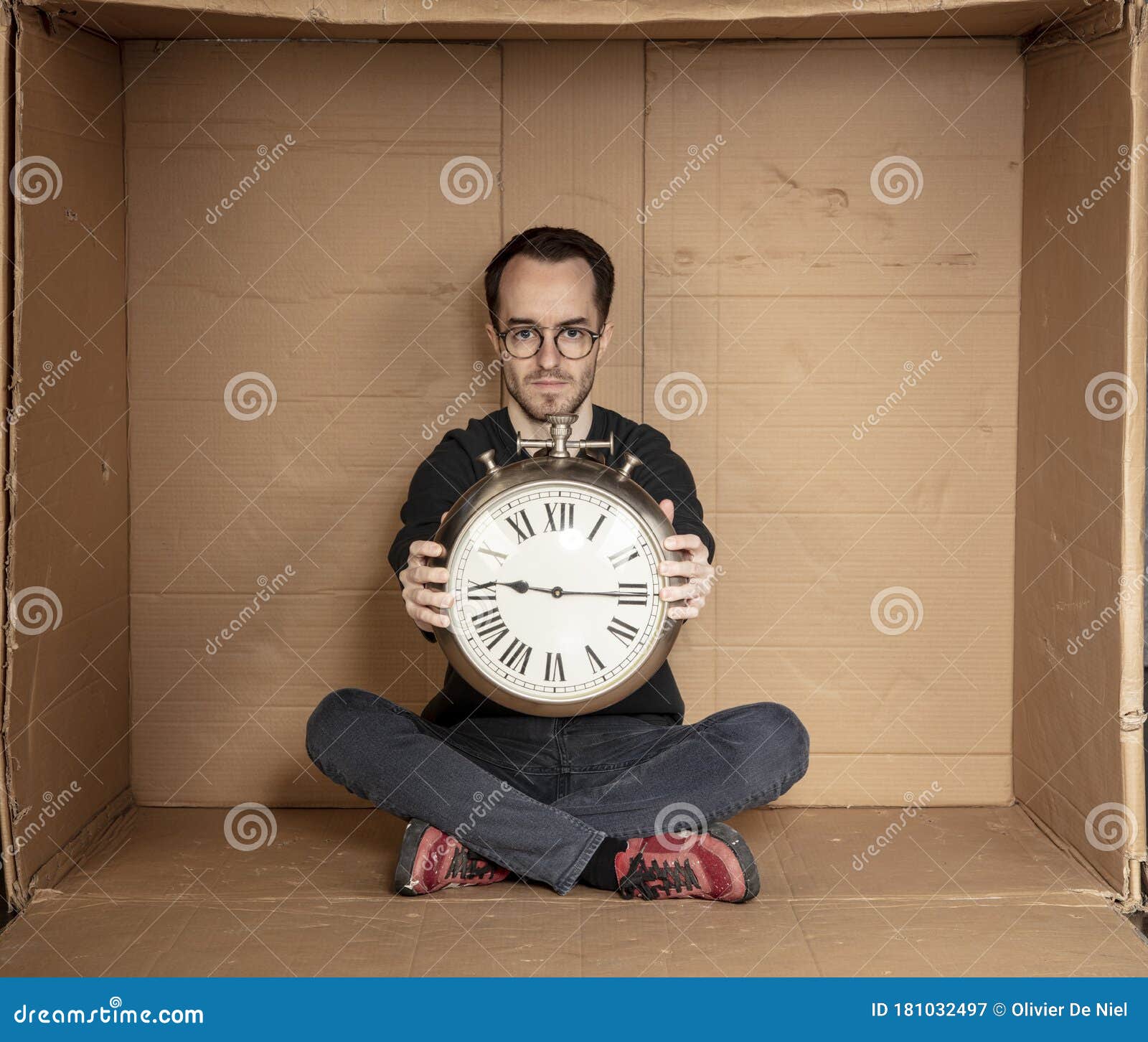 Young Unemployed Student Sits in a Tight Cardboard Box, the Idea of ...