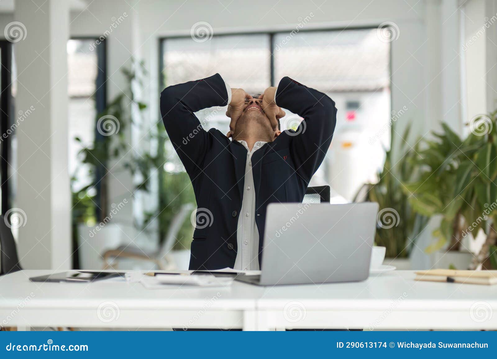 Young Unhappy Man Office Worker Feeling Bored at Work, Looking at ...