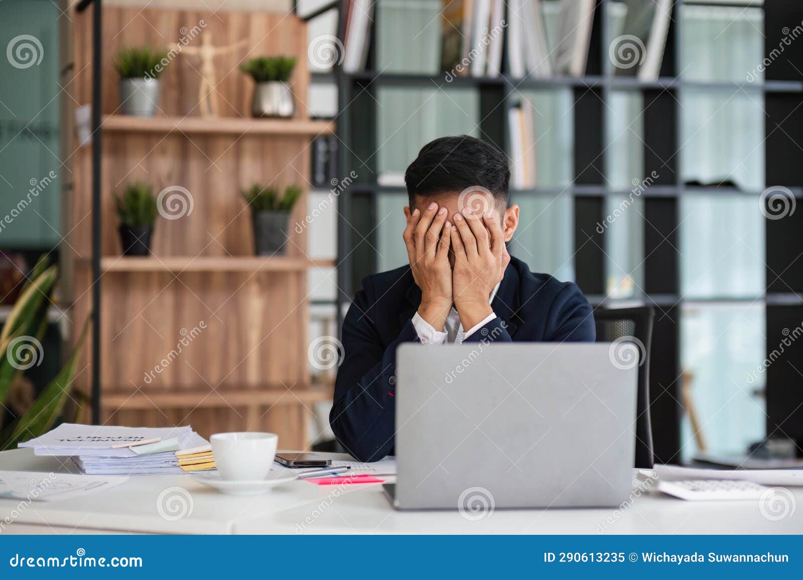 Young Unhappy Man Office Worker Feeling Bored at Work, Looking at ...