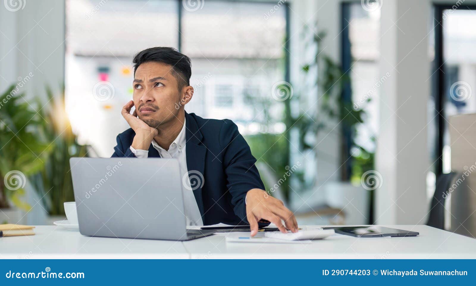 Young Unhappy Man Office Worker Feeling Bored at Work, Looking at ...