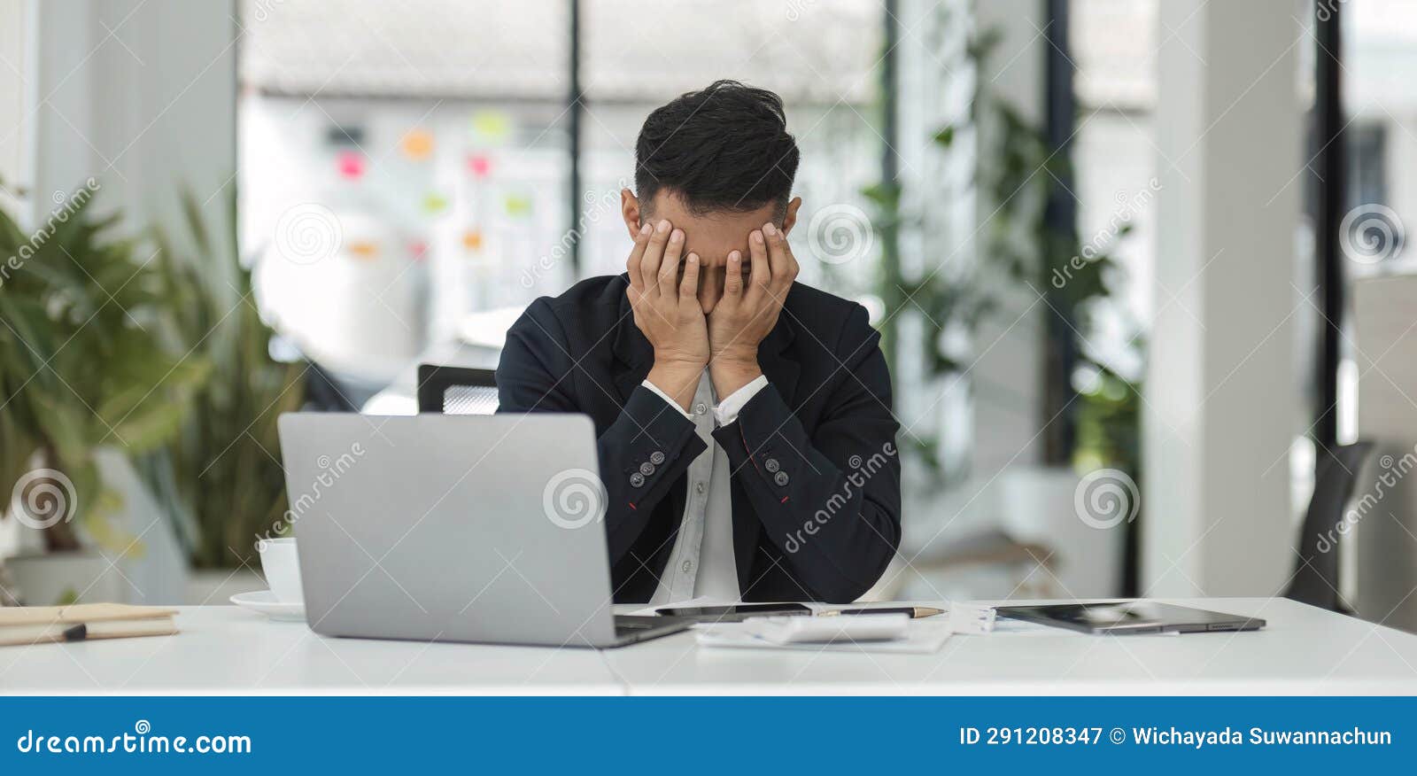 Young Unhappy Man Office Worker Feeling Bored at Work, Looking at ...