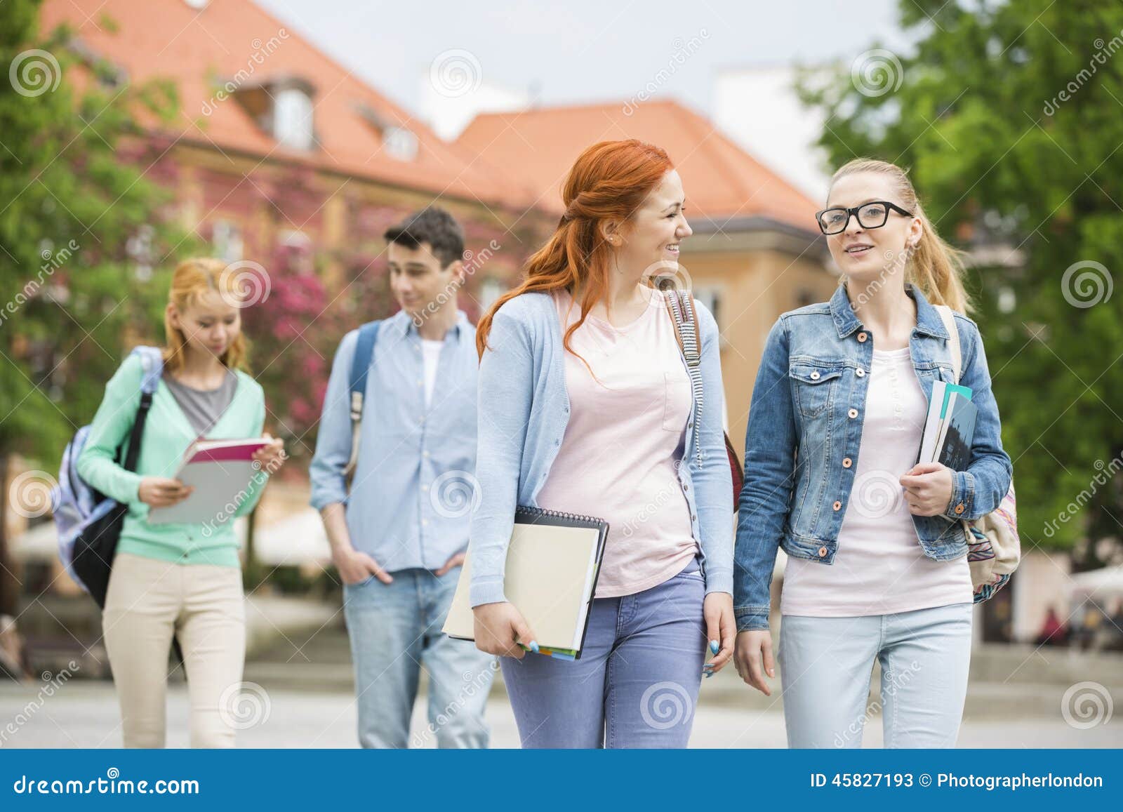 Young University Friends Walking on Street Stock Image - Image of ...