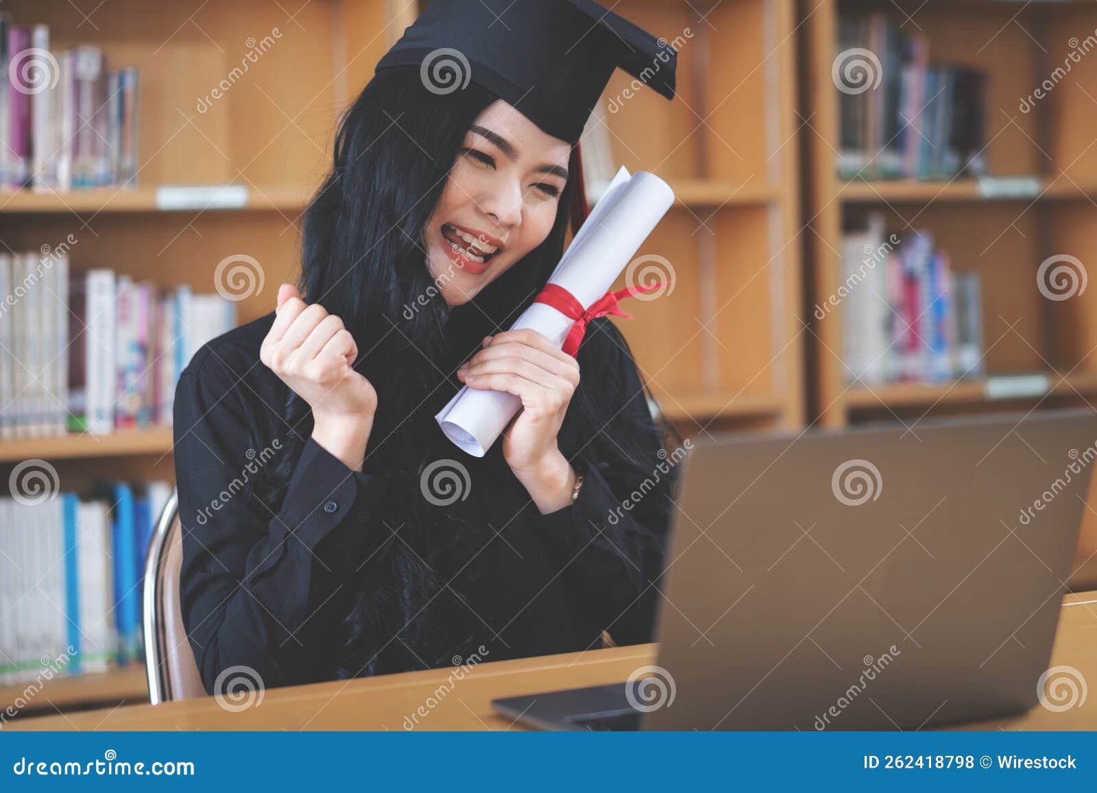 Young University Student Expressing Joy and Excitement for Graduation ...