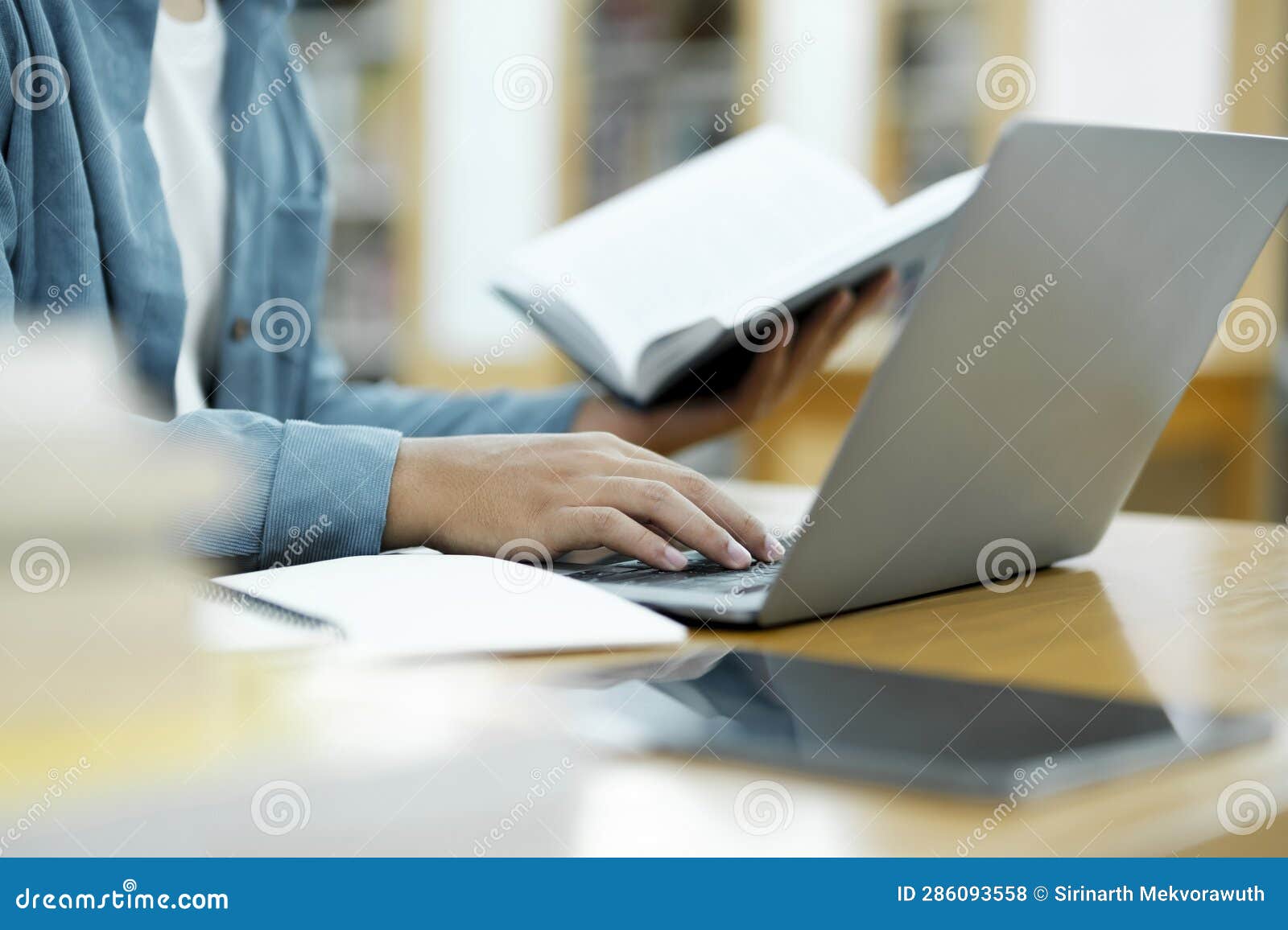Young University Student Using Laptop for Online Learning, Searching ...