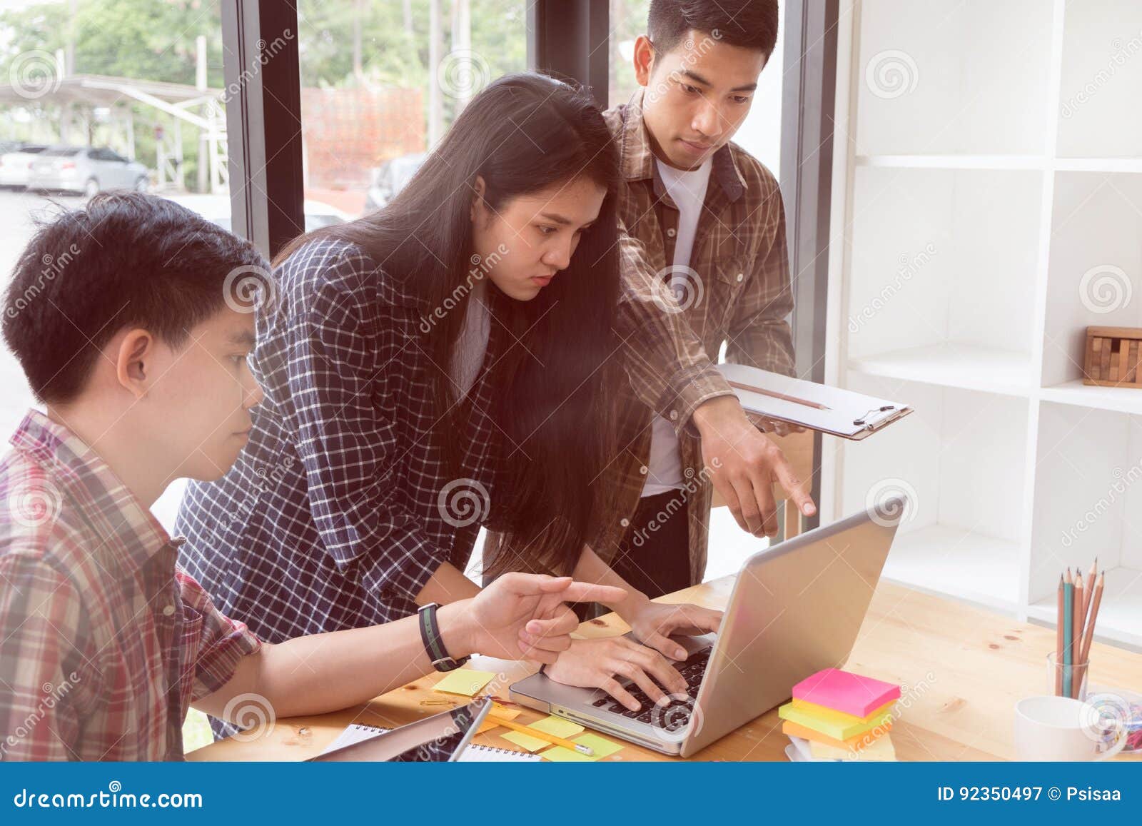 Young University Students Studying with Computer and Tablet in C Stock ...