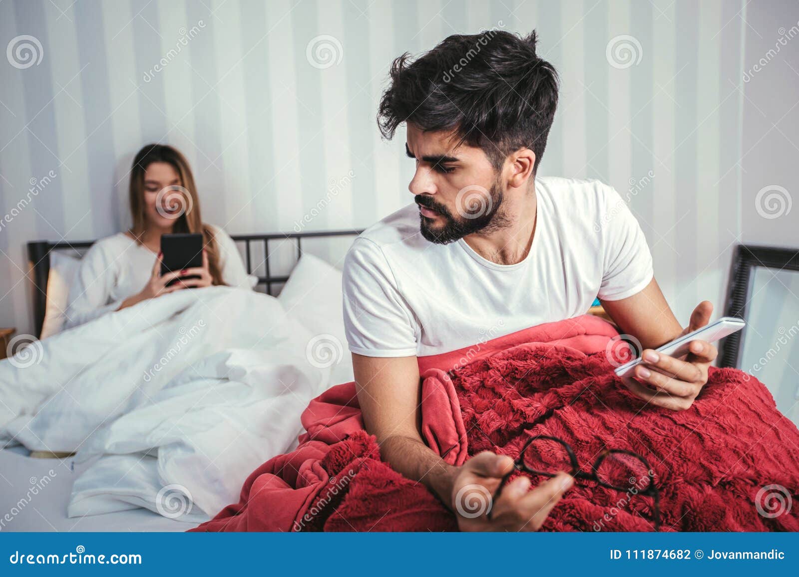 Young Upset Couple Lying Separate In A Bed Stock Photography ...