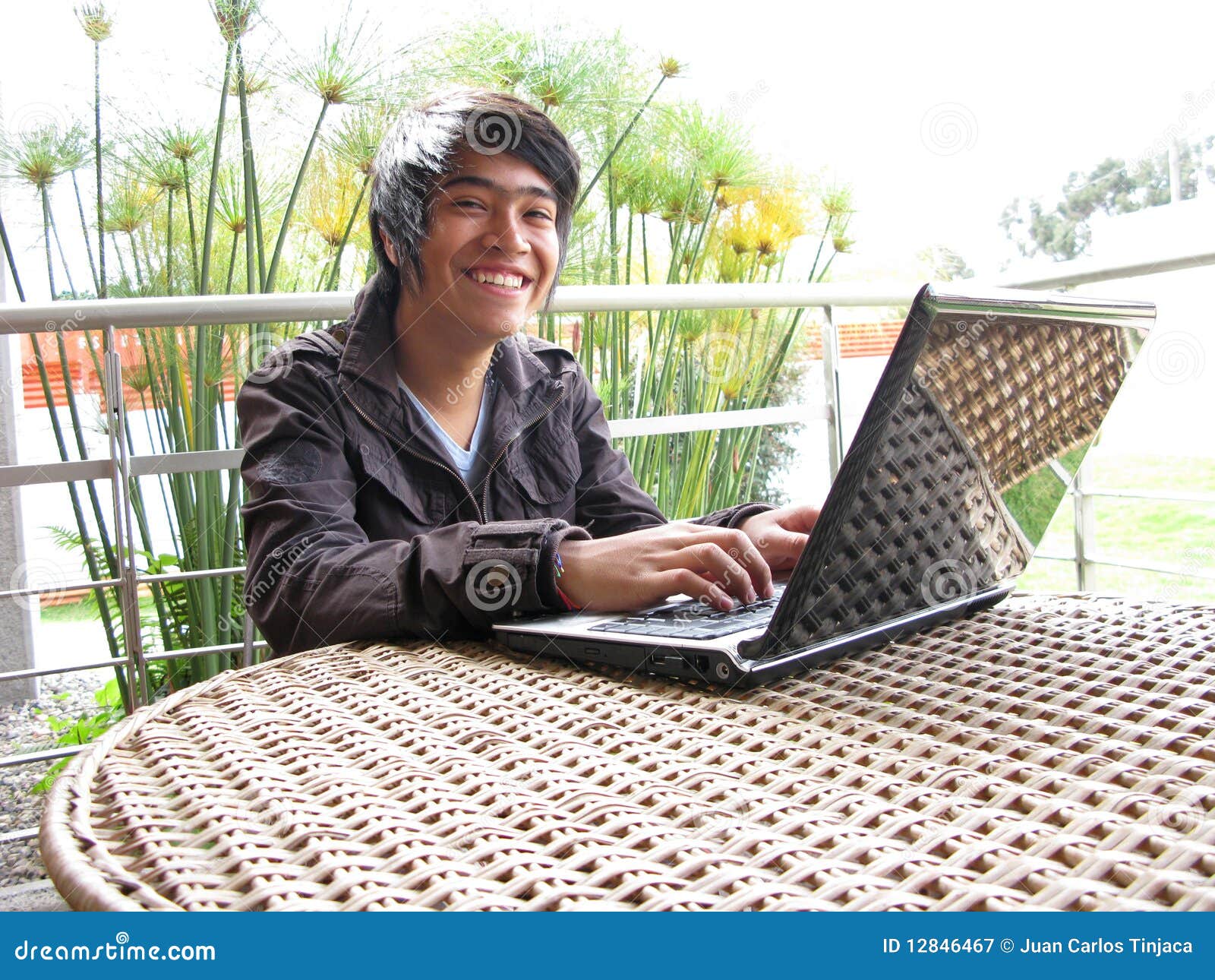 Young Using Laptop Outdoors Stock Image - Image of person, suit: 12846467