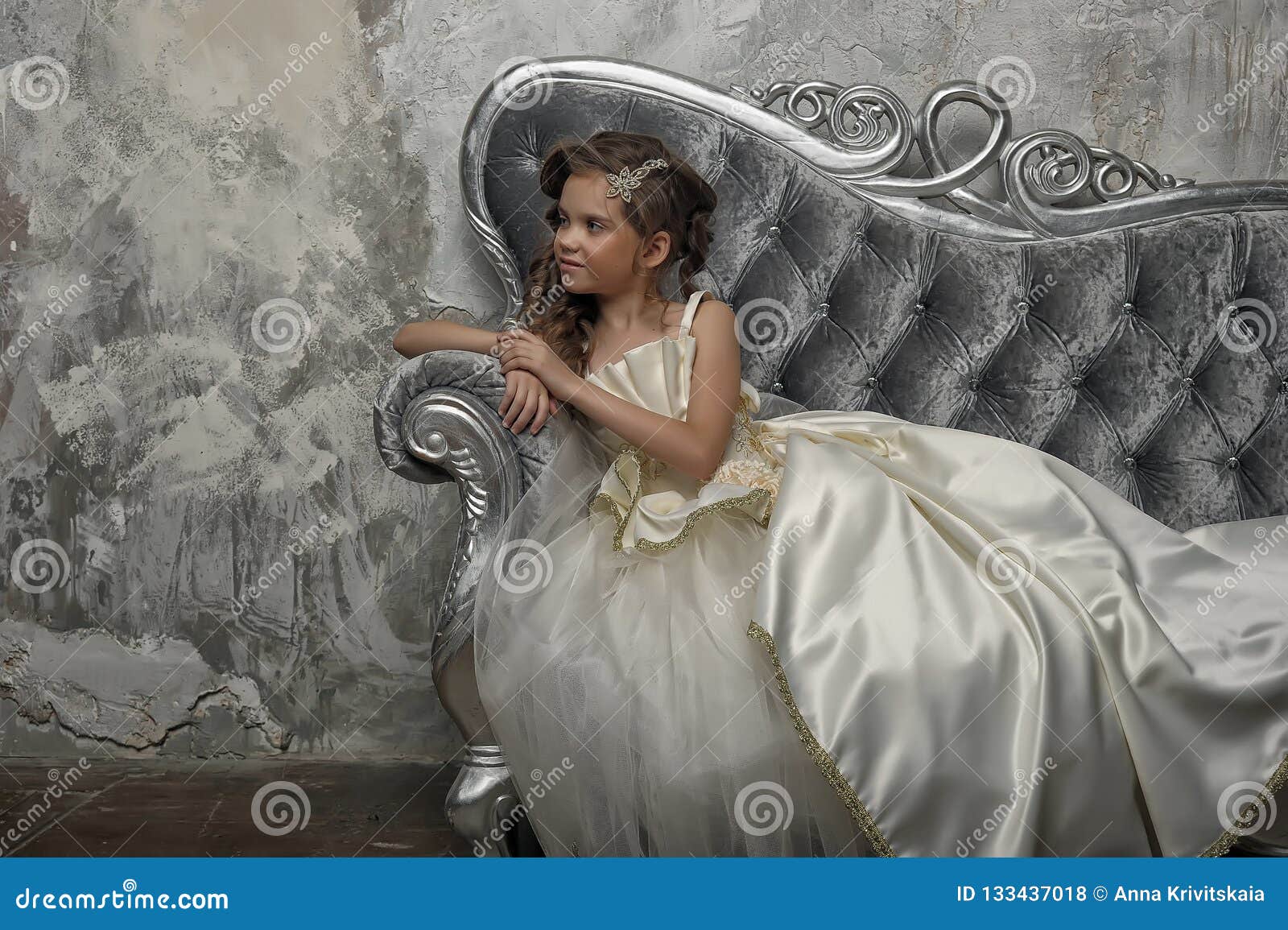 Young Victorian Princess Sitting on a Silver Sofa Stock Photo - Image ...