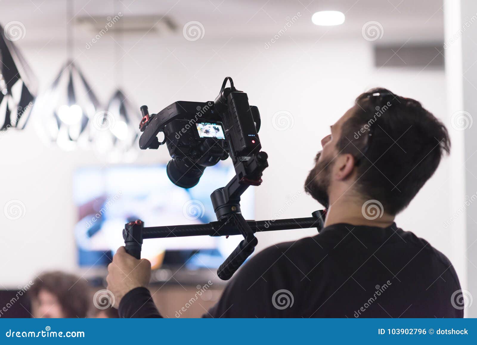 Videographer at work stock photo. Image of frame, black - 103902796