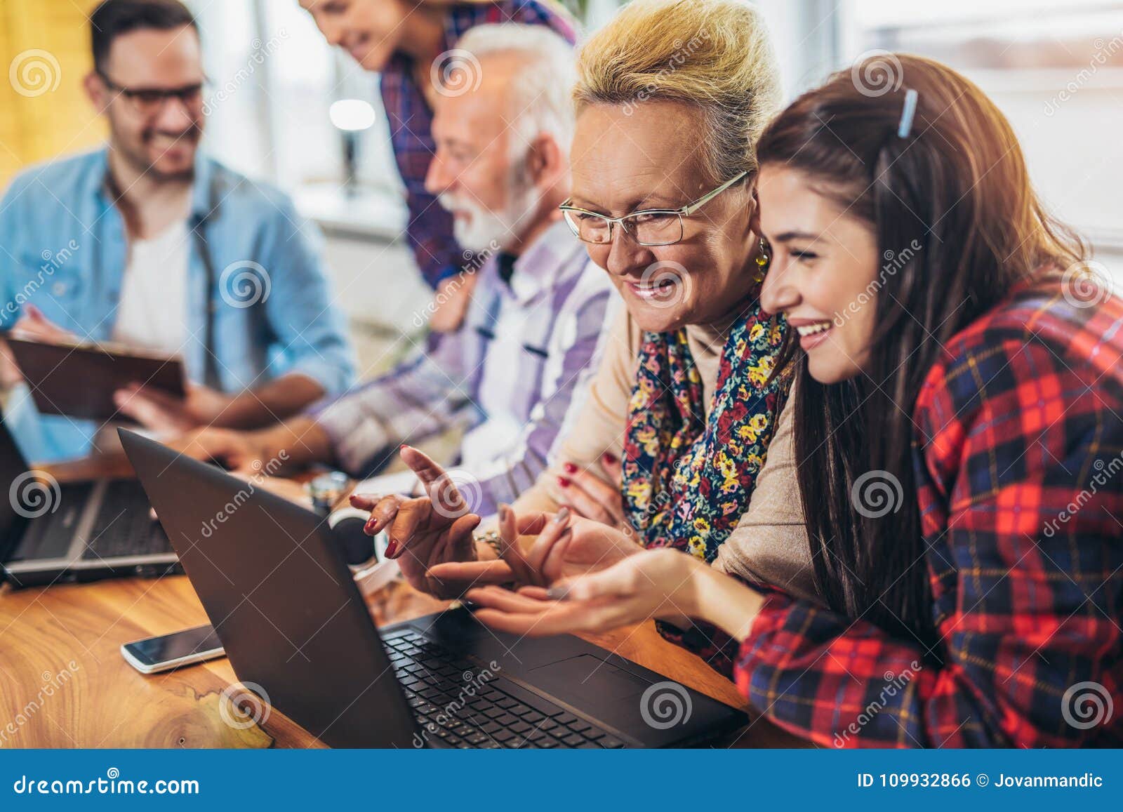 Young Volunteers Help Senior People on the Computer Stock Photo - Image ...