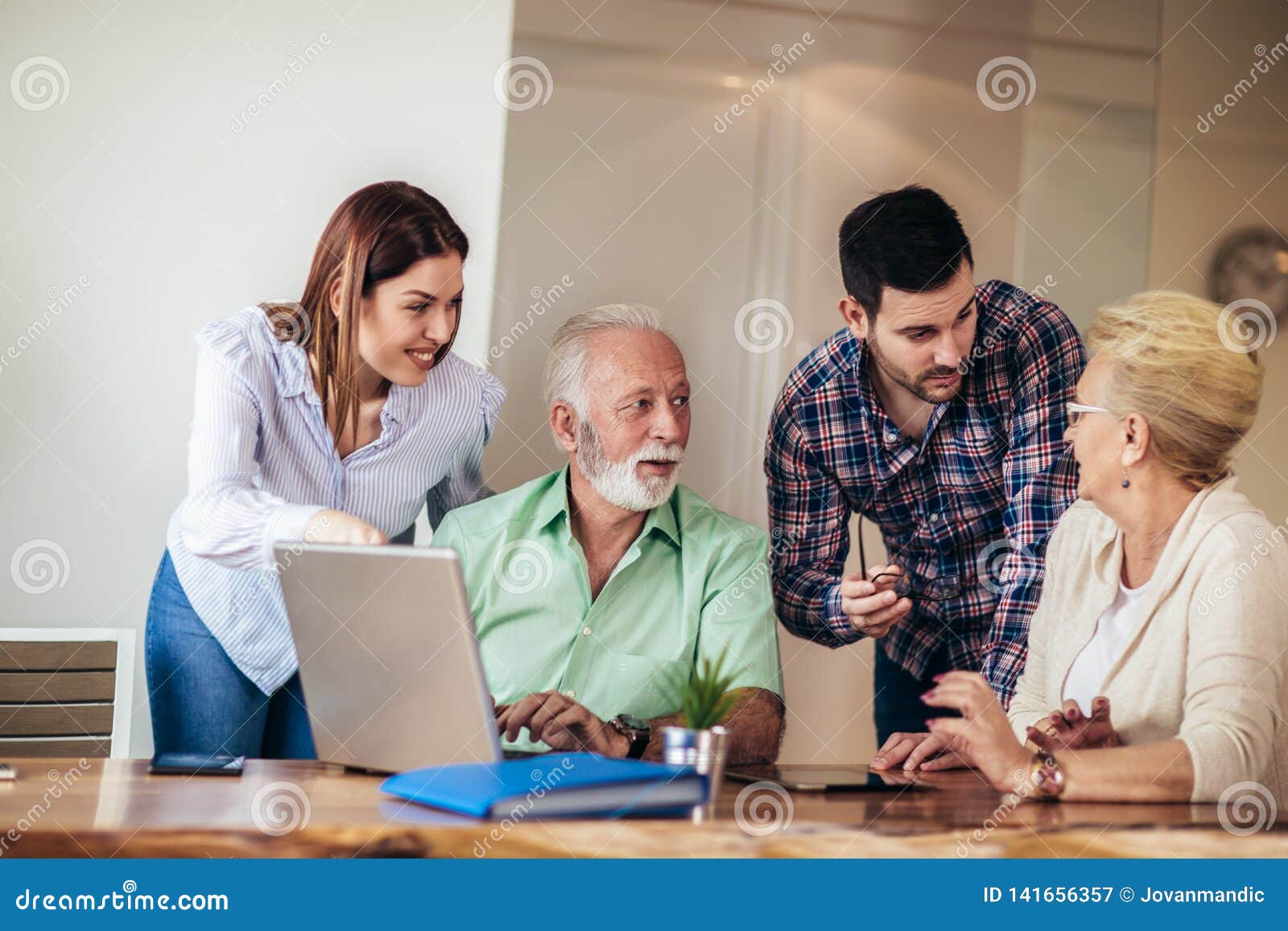 Volunteers Help Senior People on the Computer. Young People Giving ...