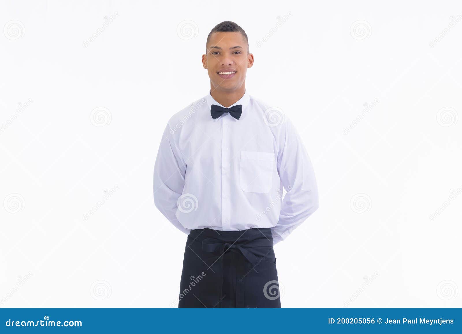 Young Waiter Standing Up with Hands in the Back Stock Photo - Image of ...