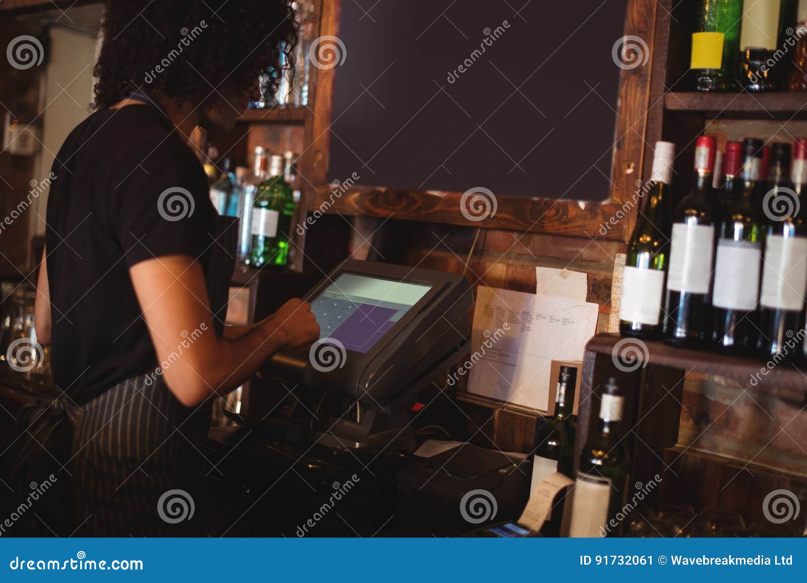 Young Waiter Using a Machine Stock Image - Image of maintenance ...