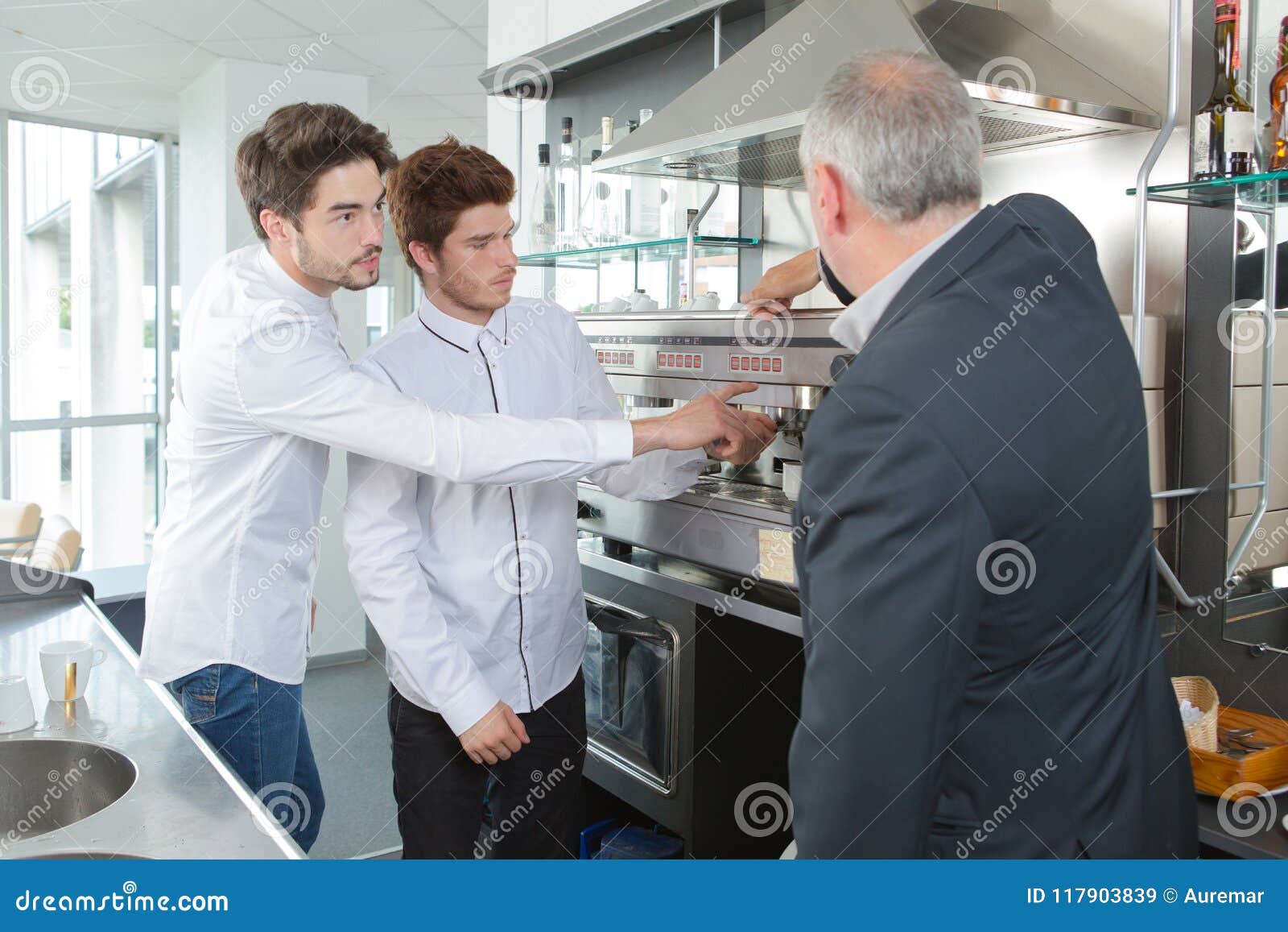 Young Waiters Learning To Use Coffee Machine Stock Image - Image of ...