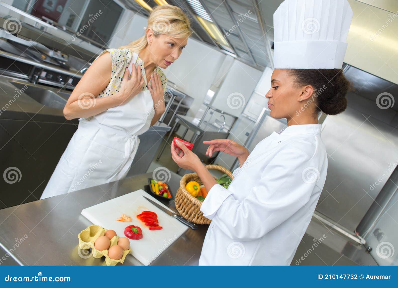 Young Waitress and Chef Fighting in Kitchen Stock Photo - Image of girl ...