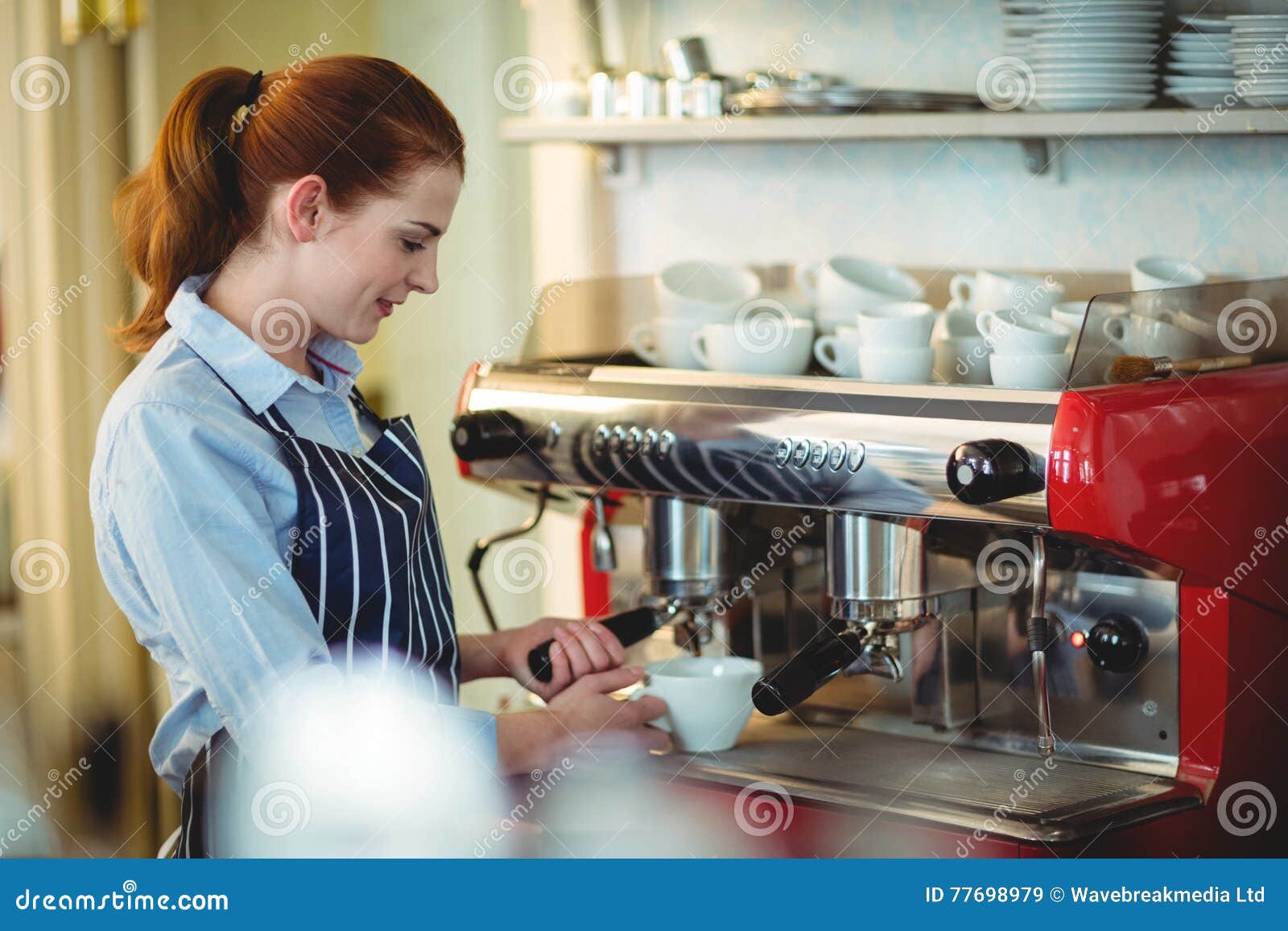 Young Waitress Using Coffee Maker At Cafeteria Royalty-Free Stock ...