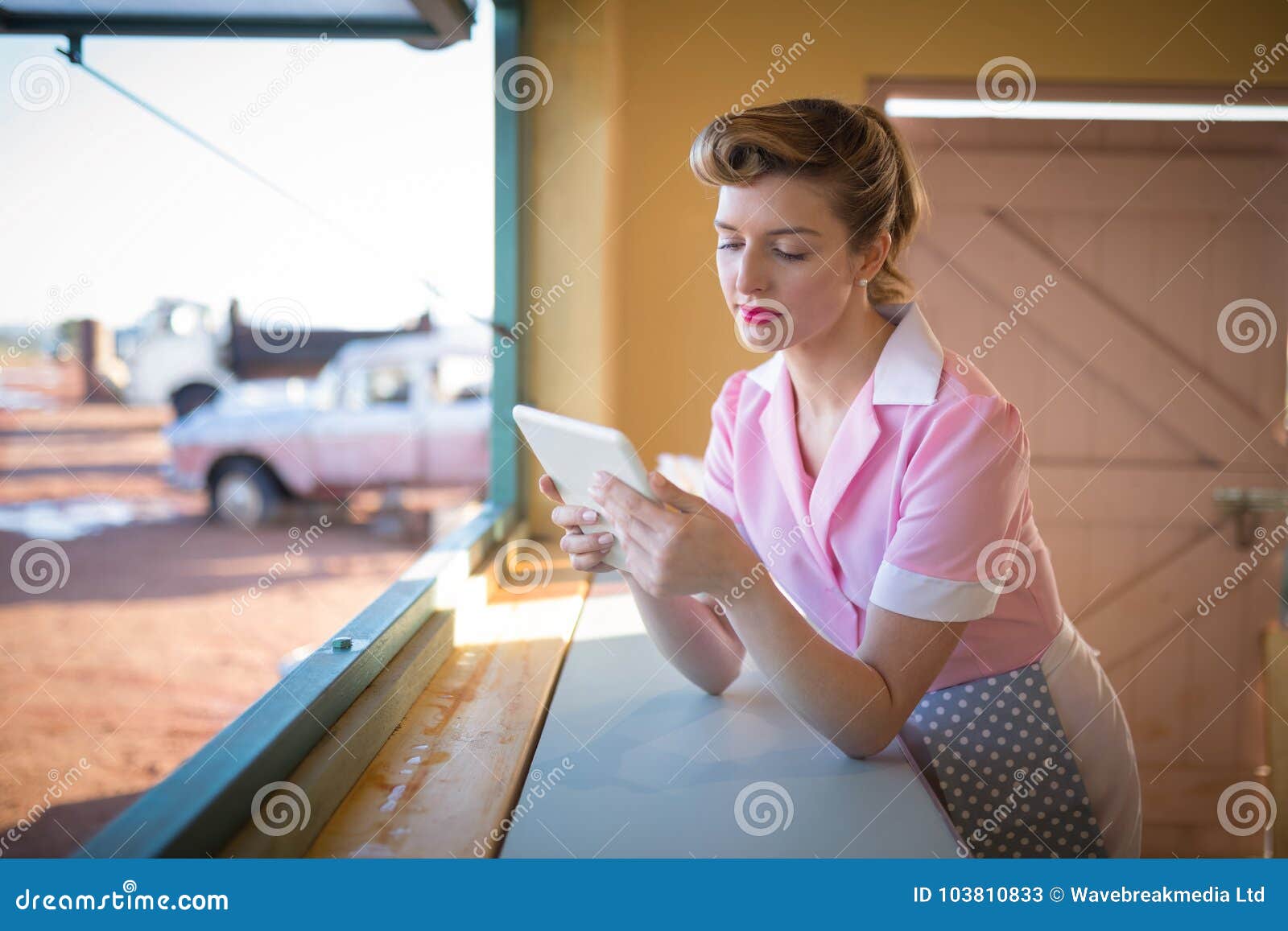 Waitress Using Digital Tablet in Restaurant Stock Image - Image of ...