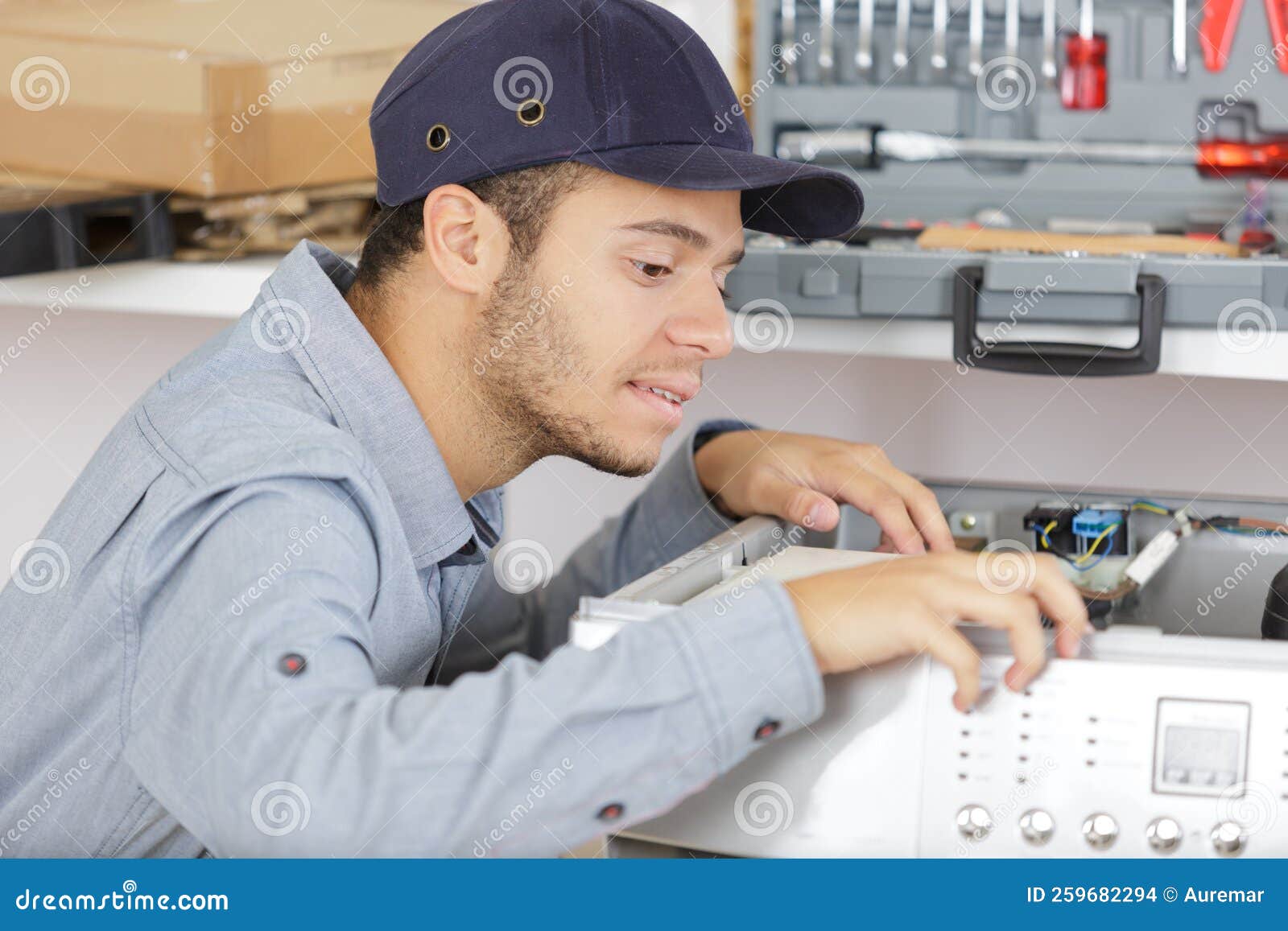 Young Washing Machine Serviceman on Call-out Stock Photo - Image of ...