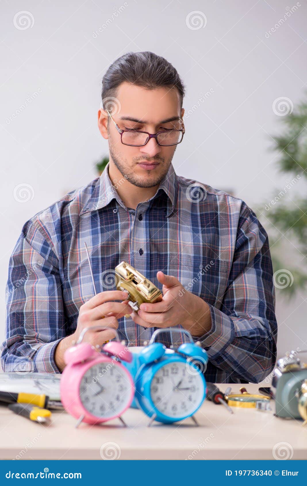 Young Male Watchmaker Working in the Workshop Stock Photo - Image of ...