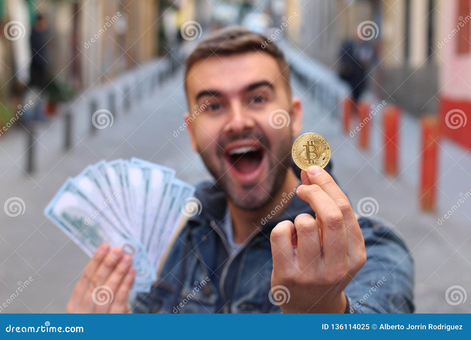 Young Wealthy Man Holding a Bitcoin Stock Image - Image of businessman ...