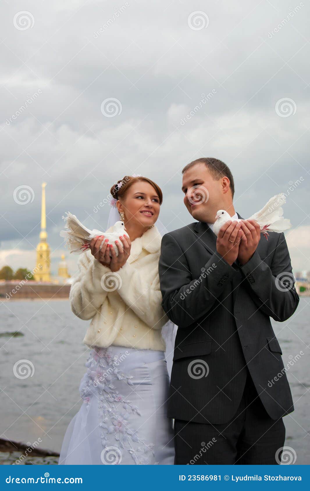 Young wedding couple stock image. Image of holding, neva - 23586981