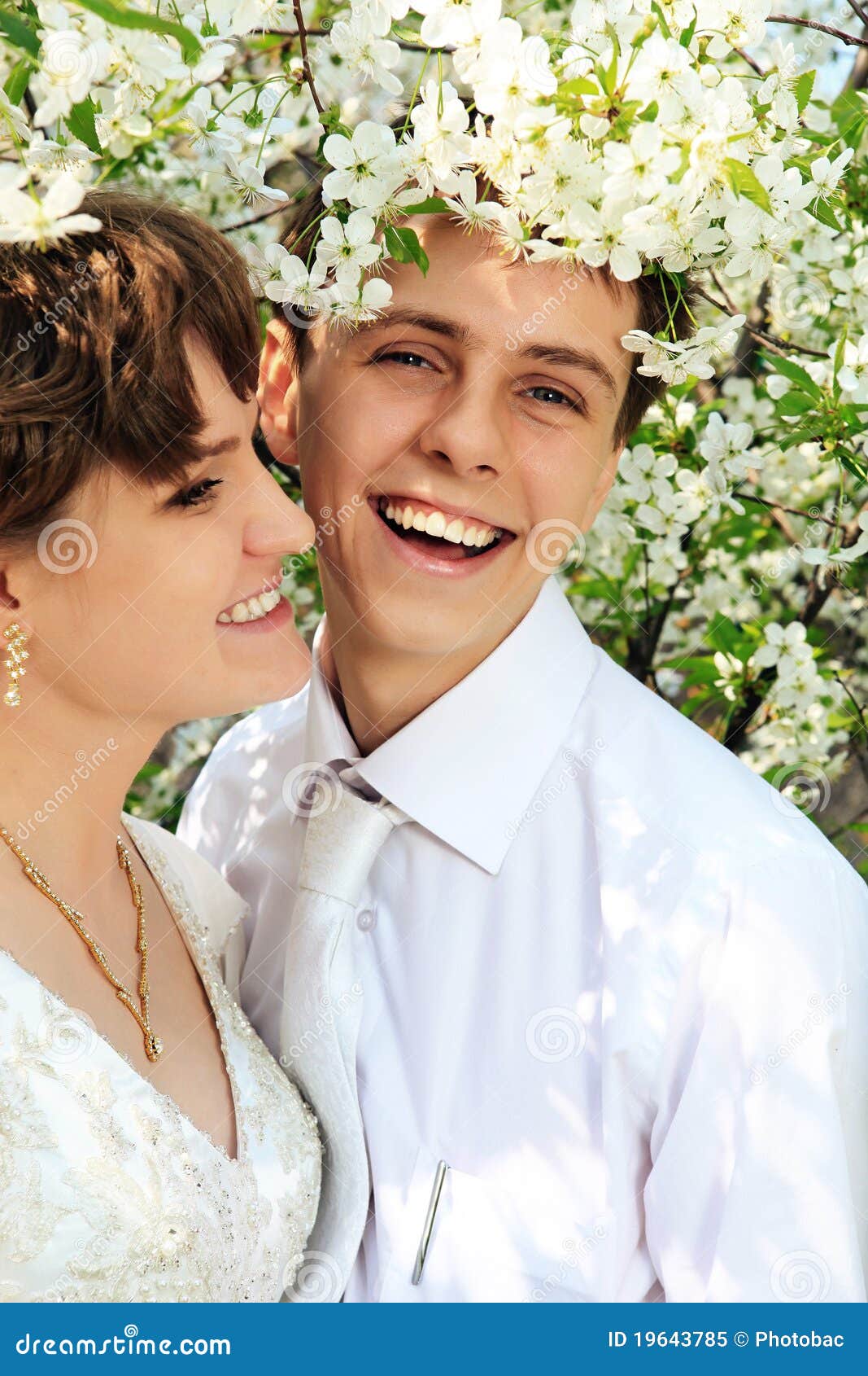 Young Wedding Couple in Spring Blossom Stock Image - Image of floral ...
