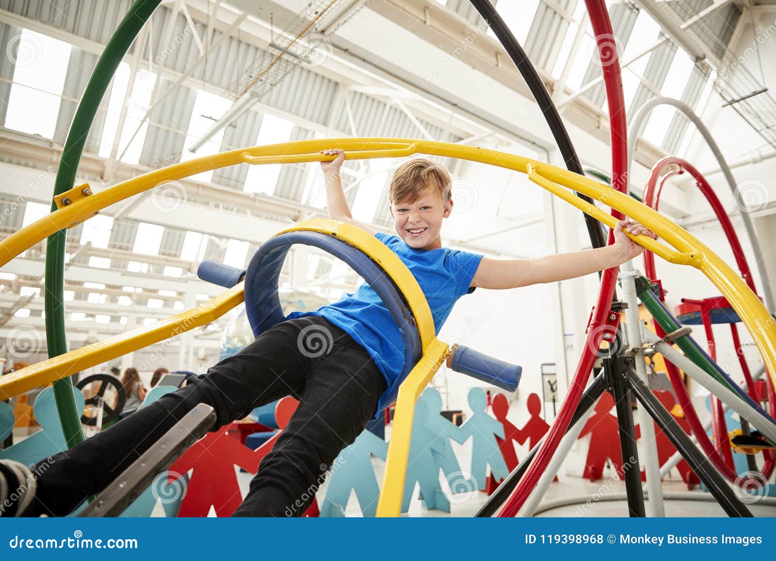 Young White Boy Having Fun Using a Human Gyroscope Stock Photo - Image ...