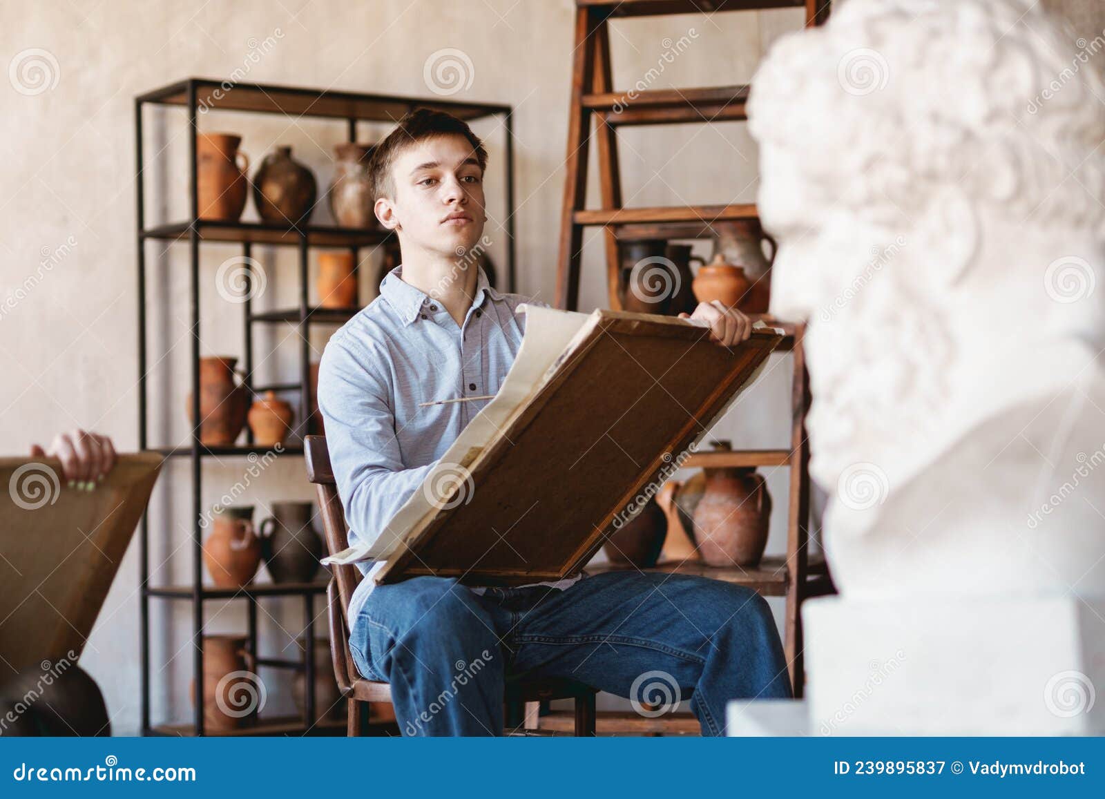 Young White Student Drawing Plaster Bust during Class in Art School ...