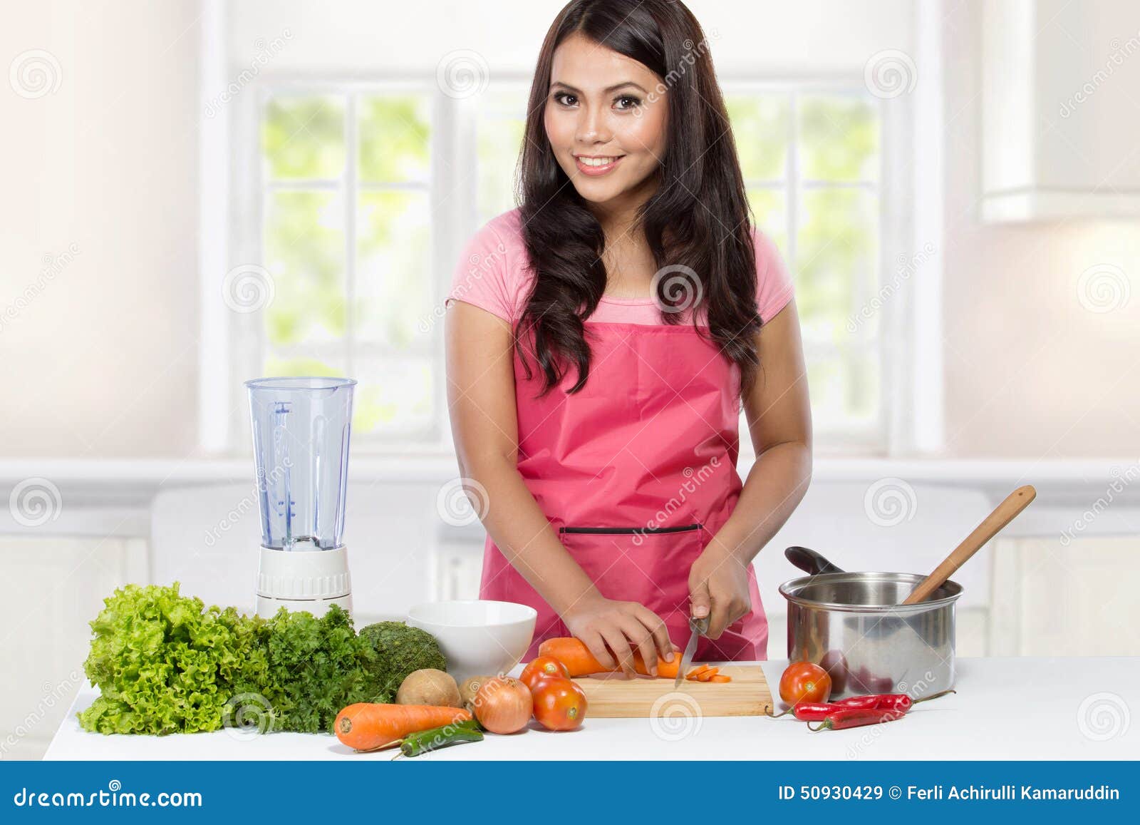 Young wife cooking stock image. Image of kitchen, cheerful - 50930429
