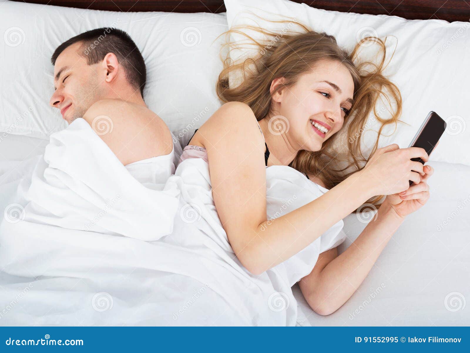 Young Wife Texting with Lover on Smartphone Stock Image - Image of ...